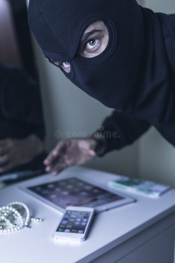 Thief in black mask stock image. Image of criminal, stealing - 65245883