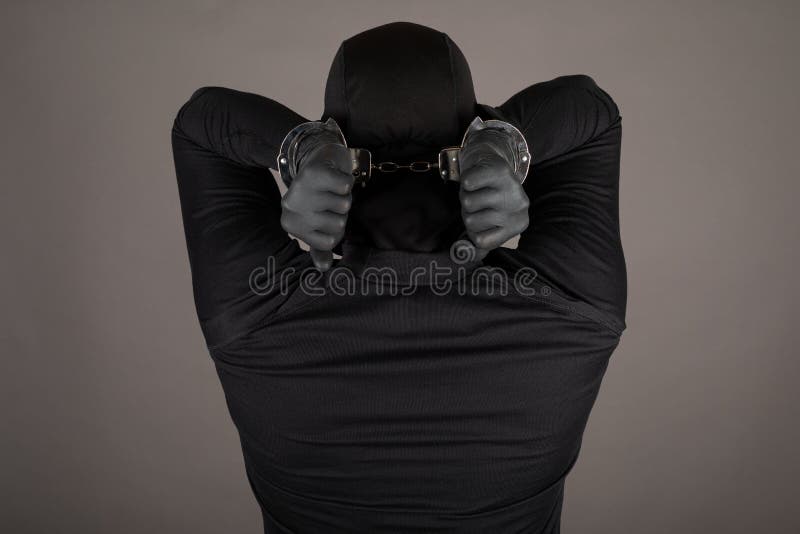 Thief in black suit stock image. Image of anonymous - 207295547