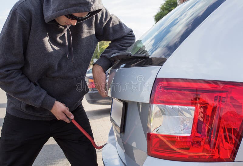 Thief breaking car stock image. Image of burglary, burglar - 45297871