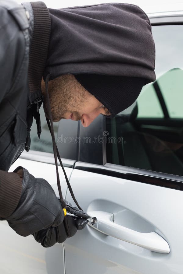 Thief Breaking into Car with Screwdriver Stock Image - Image of ...