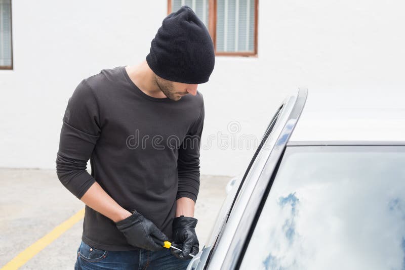 Thief Breaking into Car with Screwdriver Stock Image - Image of ...