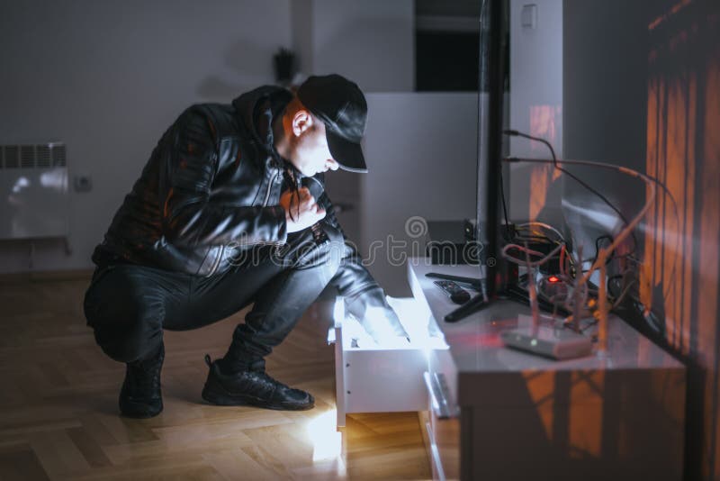 Thief Breaking into a House and Stealing Stock Image - Image of ...