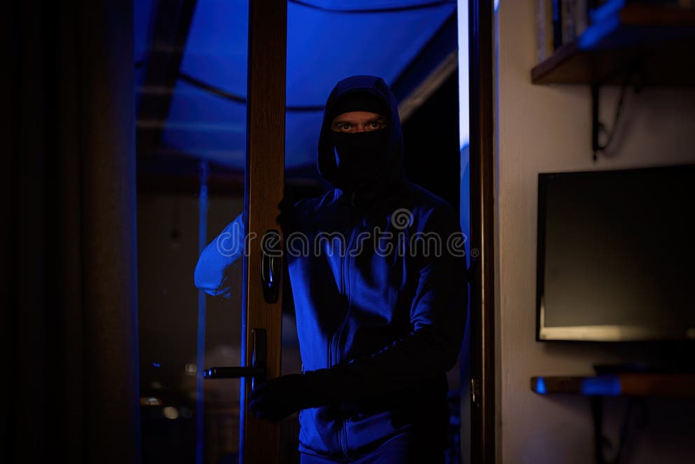 The Thief Looks through the Glass Stock Image - Image of balcony, harm ...