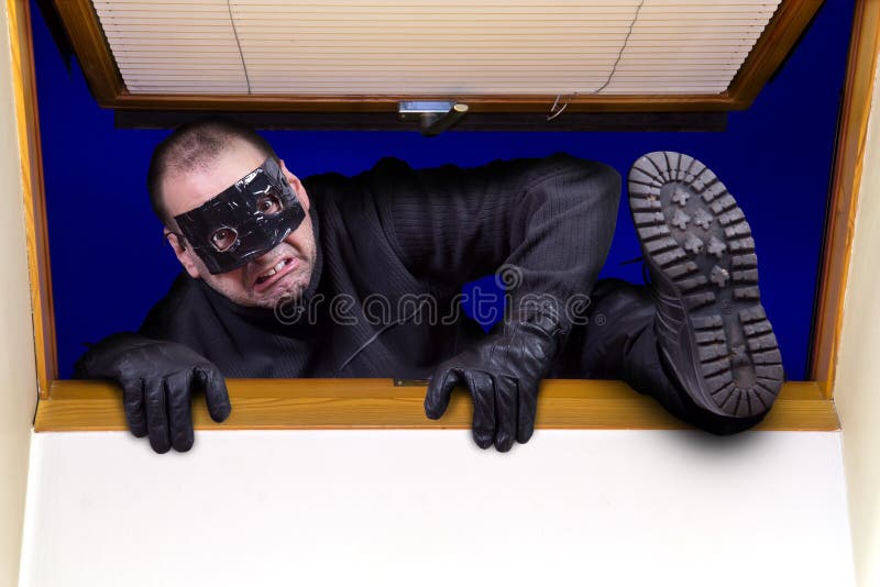 Thief Climbs into the House Stock Image - Image of illegal, funny: 48949673