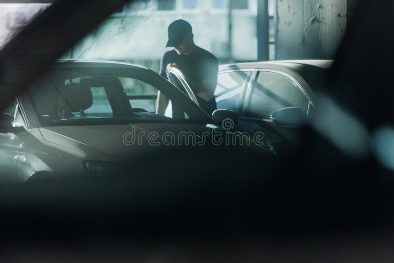 Thief entering in the car stock photo. Image of breaking - 157031236