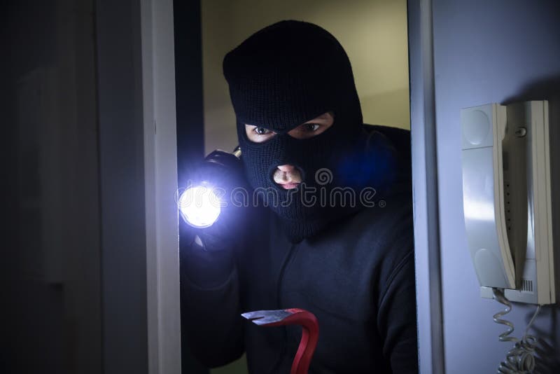 Thief Entering into House stock image. Image of male - 210428769