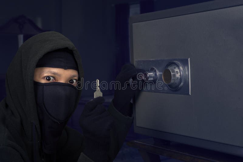 A thief getting the key 1 stock image. Image of business - 39958575