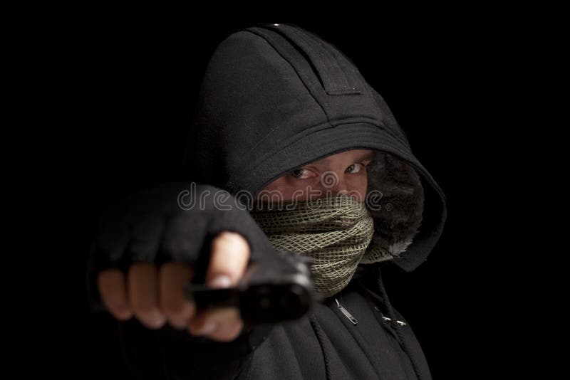 Thief with gun stock photo. Image of burglar, handgun - 17402554