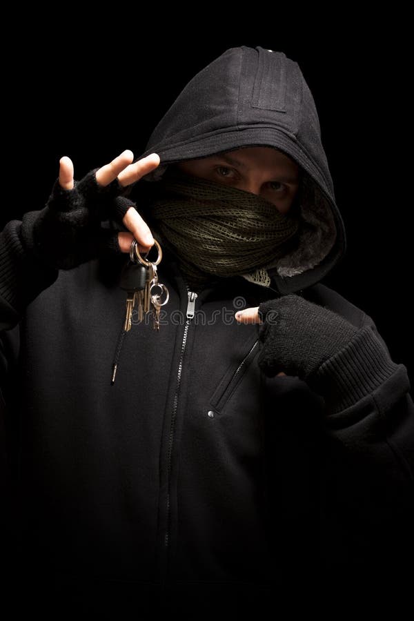 Thief with gun stock photo. Image of burglar, handgun - 17402554