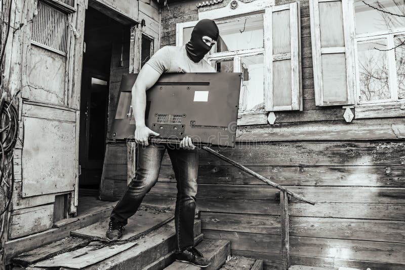 Thief in a Mask Robbed the House Stock Image - Image of hand, crowbar ...