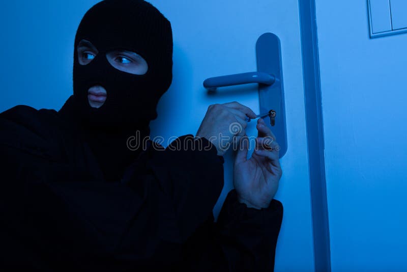 Thief Opening House Door with Tool Stock Image - Image of door, looking ...