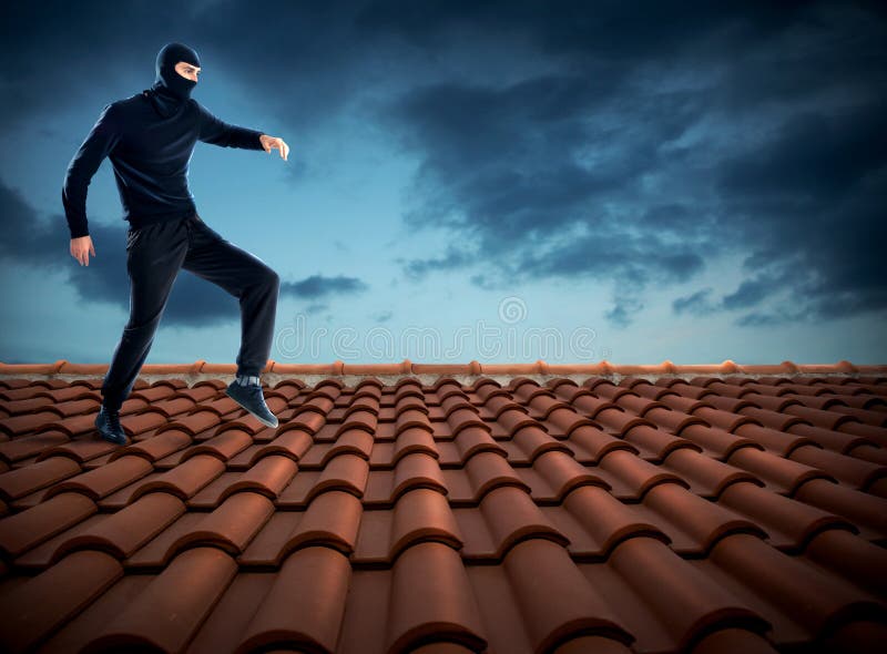 Thief on the roof stock image. Image of hidden, security - 81187801