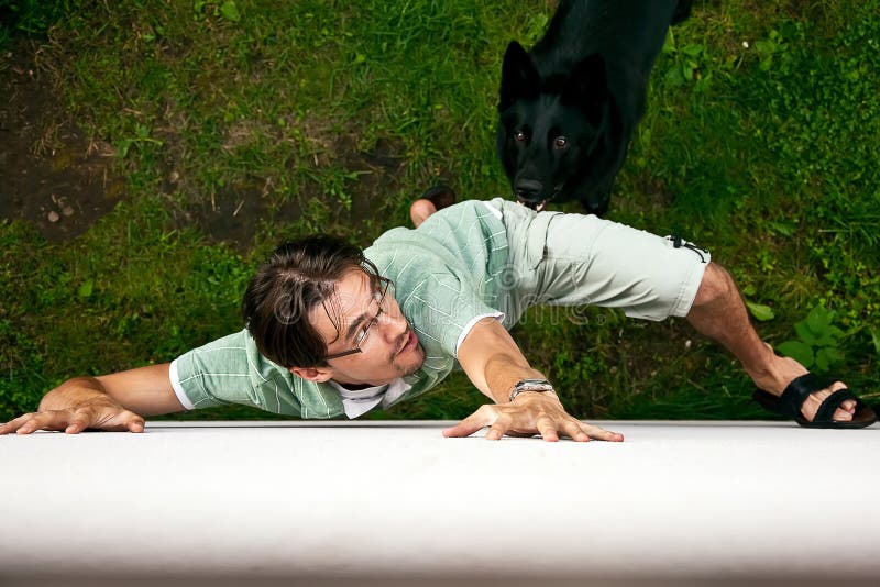 Thief running from dog. stock photo. Image of male, hungry - 27681304