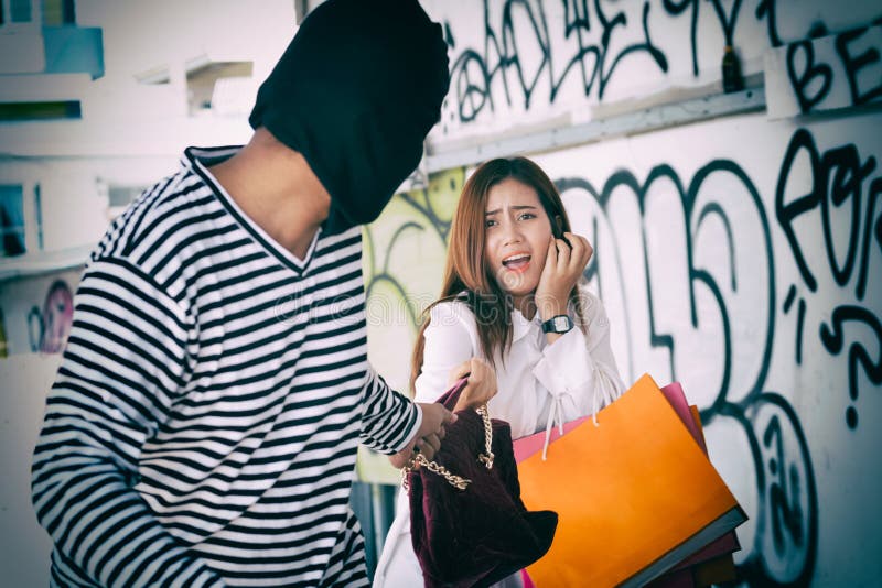 Thief Stealing a Black Leather Backpack Stealing Stock Image - Image of ...