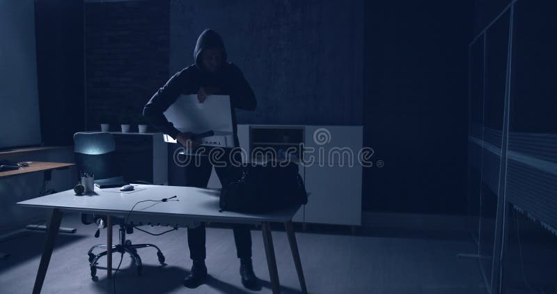 Thief Stealing Computer from Office Stock Photo - Image of office ...