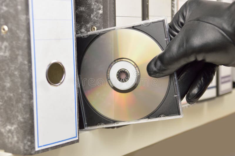 Thief Stealing Documents in Compact Disc Stock Photo - Image of binder ...