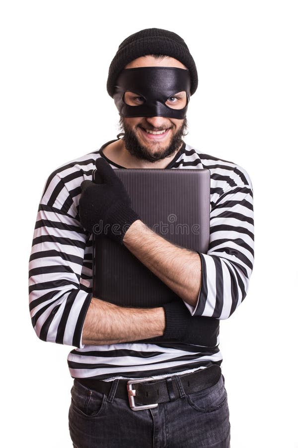 A Thief with Mask Quietly Slinking Stock Photo - Image of caucasian ...