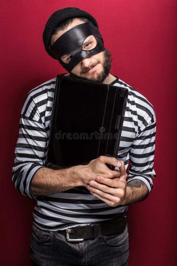 Thief Stealing a Laptop Computer Stock Photo - Image of burglary ...