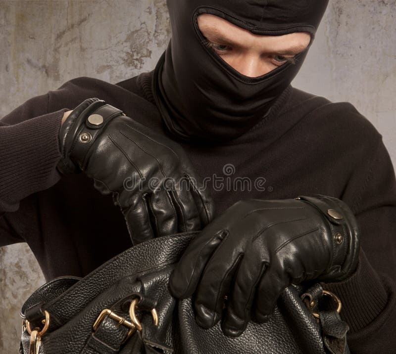 Thief stealing money stock photo. Image of leather, hand - 24885482