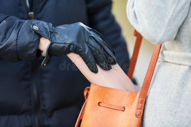 Hands of Thief Steal Wallet from Backpack Stock Photo - Image of hand ...