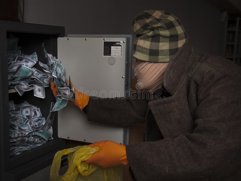 A Thief Steals Money from the Safe Stock Image - Image of carry, steal ...
