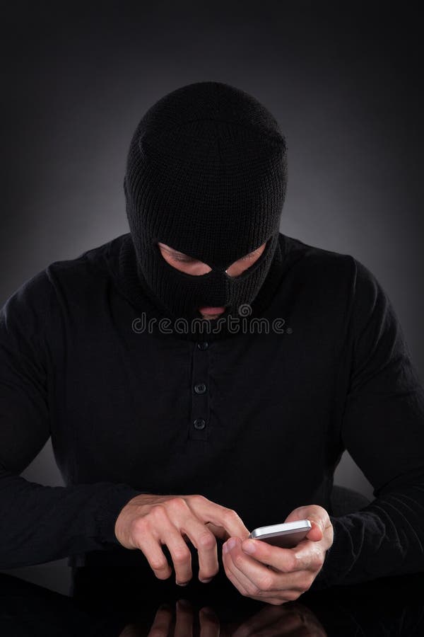 Thief Trying To Access a Stolen Mobile Phone Stock Image - Image of ...
