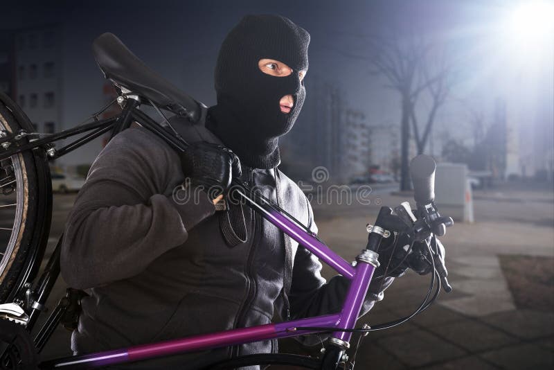 Thief Stealing a Cycle stock image. Image of people - 222445415