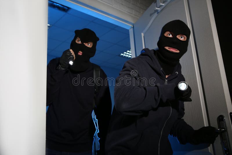 Thieves with Flashlights Breaking into House Stock Image - Image of ...