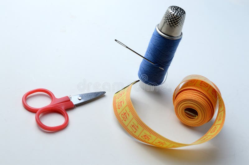 Thimble, Needle and Quilt stock image. Image of closeup - 10219921