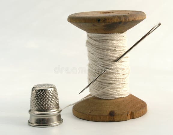 Thimble, needle and thread stock image. Image of tailoring - 210327