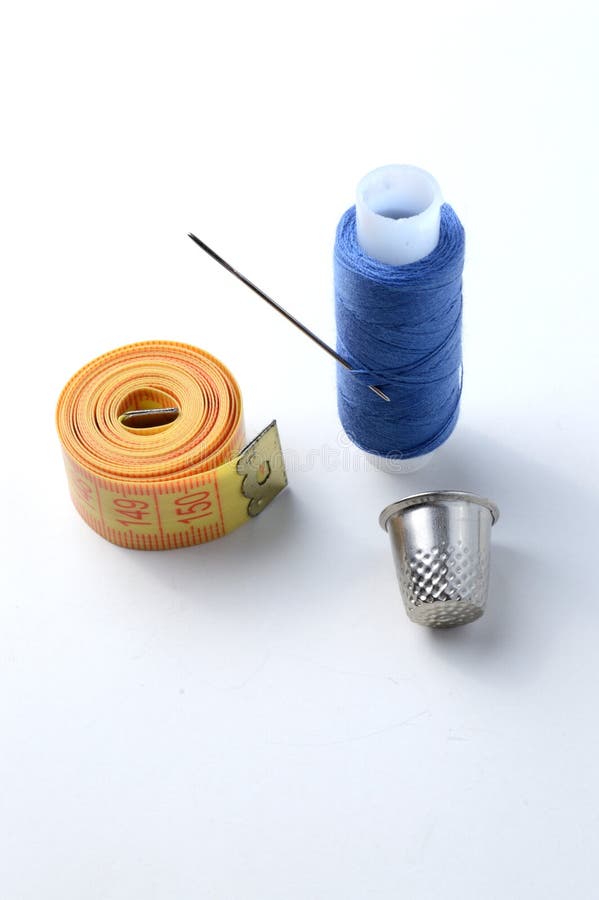Thimble, needle and thread stock image. Image of tailoring - 210327