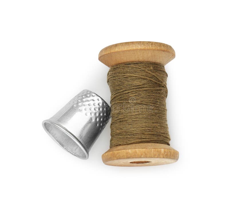 Thimble and Spool of Brown Sewing Thread Isolated on White, Top View ...