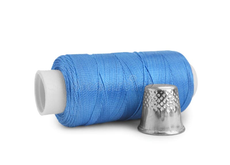 A Spool of Light Thread for Sewing Stock Photo - Image of needlework ...
