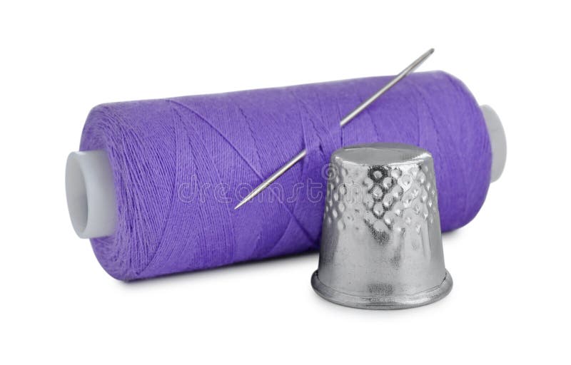 Thimble and Spool of Purple Sewing Thread with Needle Isolated on White ...