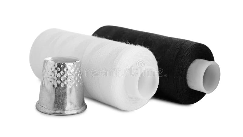 Thimble and Spools of Sewing Threads on White Stock Image - Image of ...