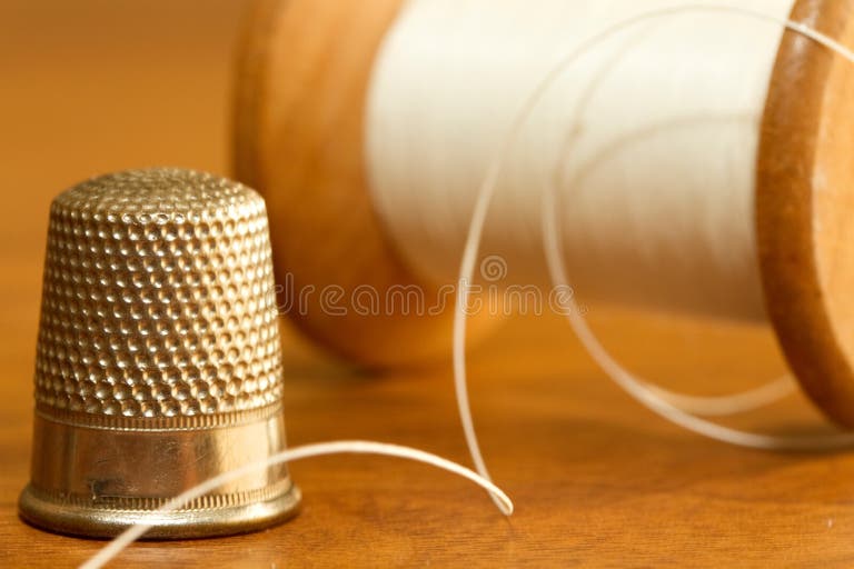 Thimble and thread stock photo. Image of wooden, creative - 32625760