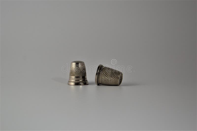 Thimble on White Desk Surface. Place for Text Stock Image - Image of ...