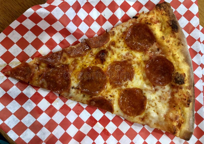 Thin crust pizza stock image. Image of checker, paper - 131398477