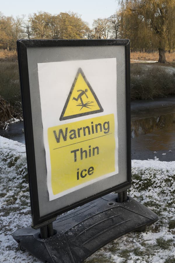 Warning sign of thin ice stock image. Image of danger - 263997069