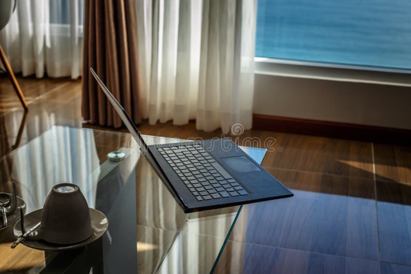 Thin Laptop on Glass Table. Stock Photo - Image of digital, glass ...