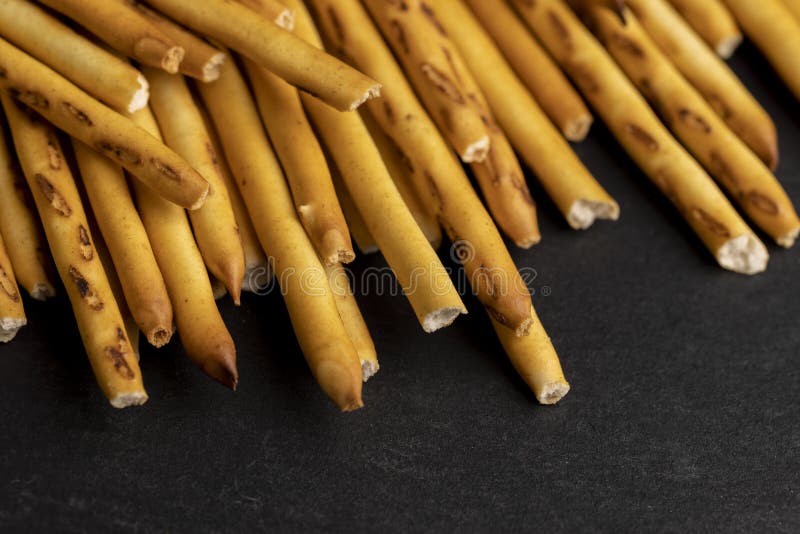 Thin and Long Bread Sticks Made of Wheat Flour on the Table Stock Image ...