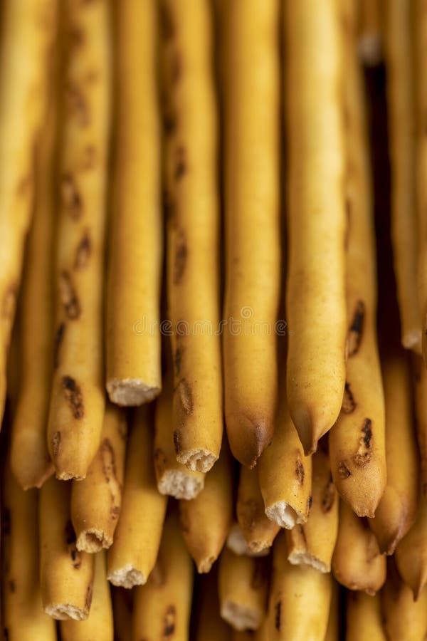 Thin and Long Bread Sticks Made of Wheat Flour on the Table Stock Photo ...