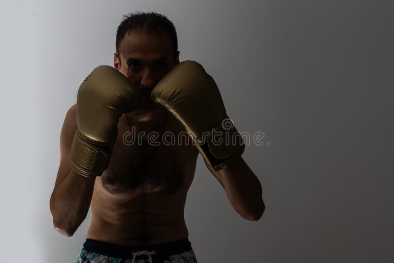 The Thin Man in Boxing Gloves. Stock Image - Image of slim, boxer ...