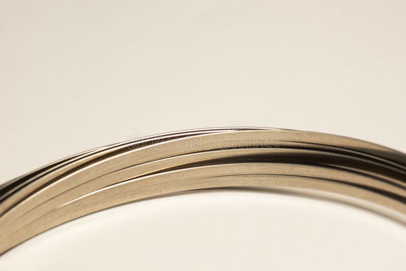 A Thin Metal Strip on a Light Background Stock Image - Image of ...