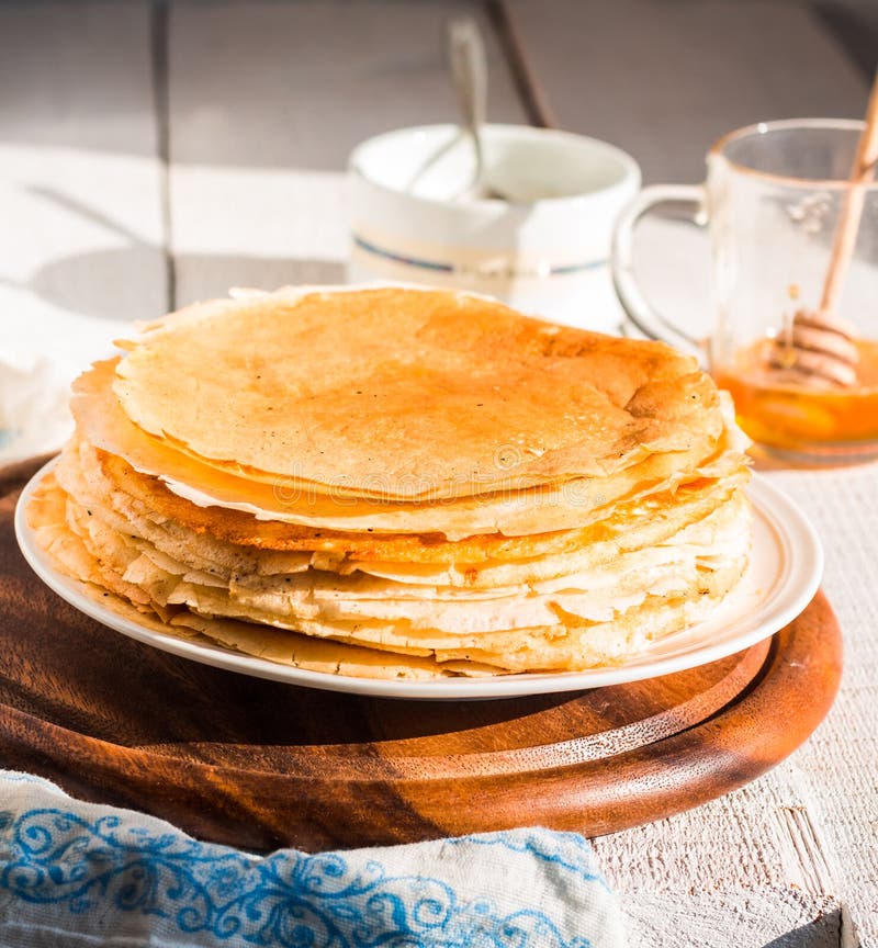 Thin Pancakes with Honey and Sour Cream, Rustic Stock Photo - Image of ...