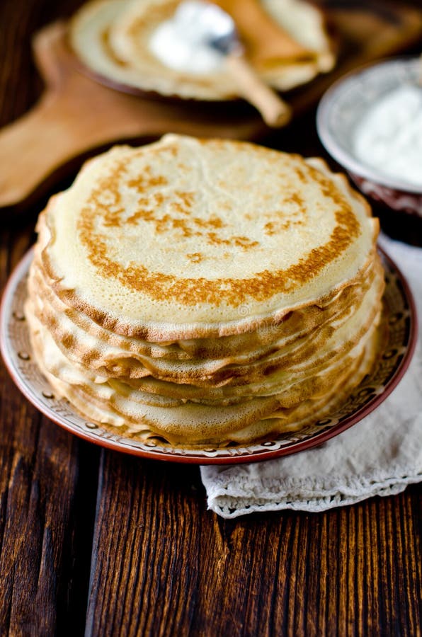 Thin Pancakes on a Wooden Table Stock Photo - Image of pastry, gourmet ...