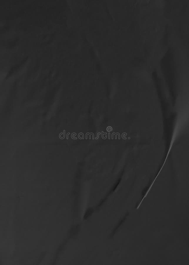 Vertical Thin Paper with Crumpled Black Surface Close-up Stock ...