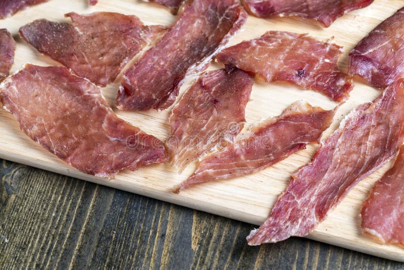 Thin Pieces of Dried Meat with Spices Stock Photo - Image of thin, beef ...