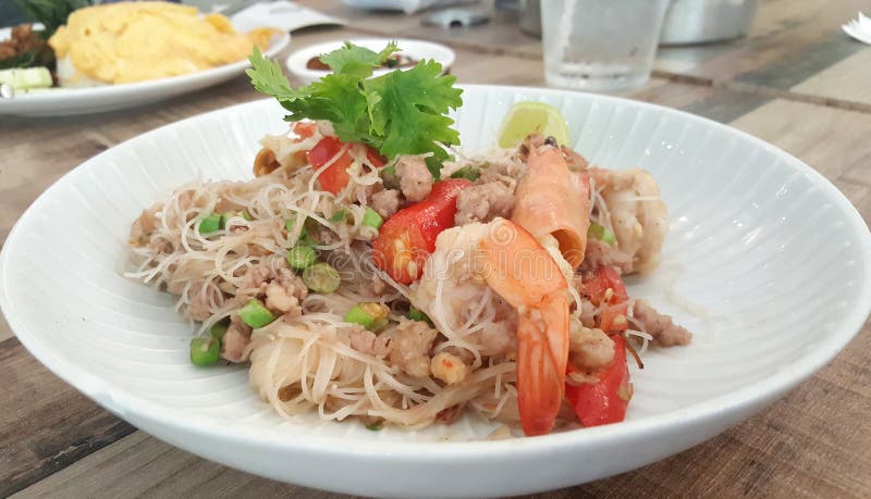 Thin Rice Noodles Stir Fried with Thai Paste Sauce Stock Image - Image ...