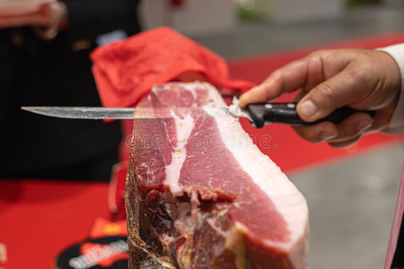 Thin Slice of Raw Ham Leg Inside Cutting Holder Cut by Hand with a ...